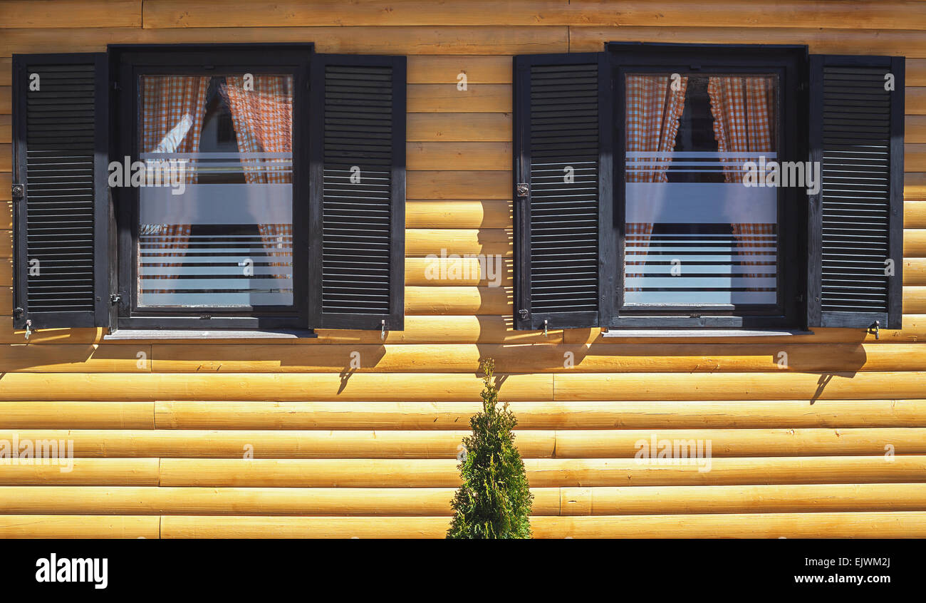 Facade of a wooden house, exterior view on window and wall Stock Photo ...