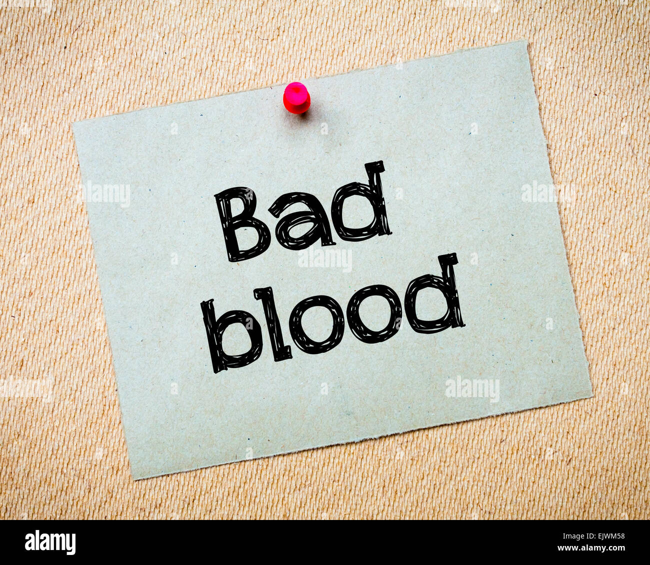 Bad Blood Message. Recycled paper note pinned on cork board. Concept ...