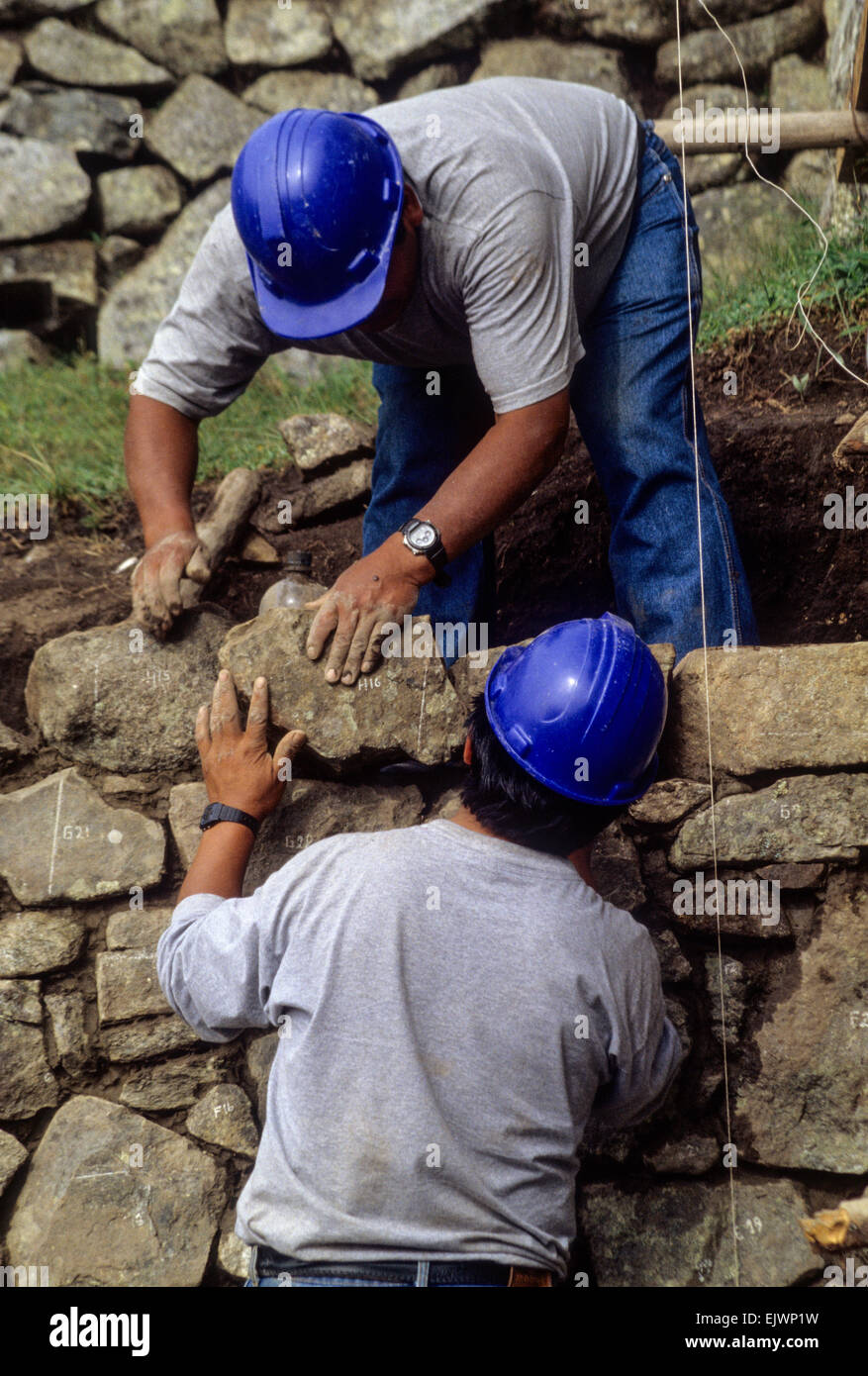 Peru, Machu Picchu. Historic Preservation. Workers Reconstructing Walls ...