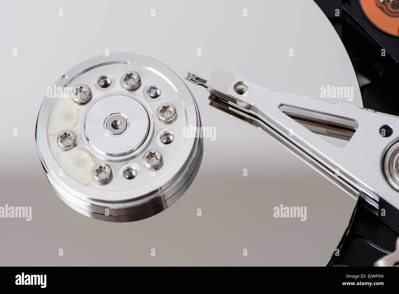 closeup of disassembled Hard disk drive. The images include Actuator ...