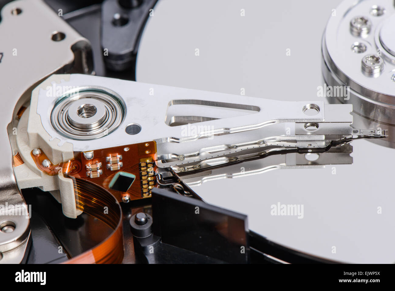 closeup of disassembled Hard disk drive. The images include Actuator ...