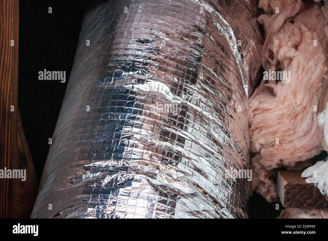 Close up of insulated attic duct and pink insulation Stock Photo - Alamy