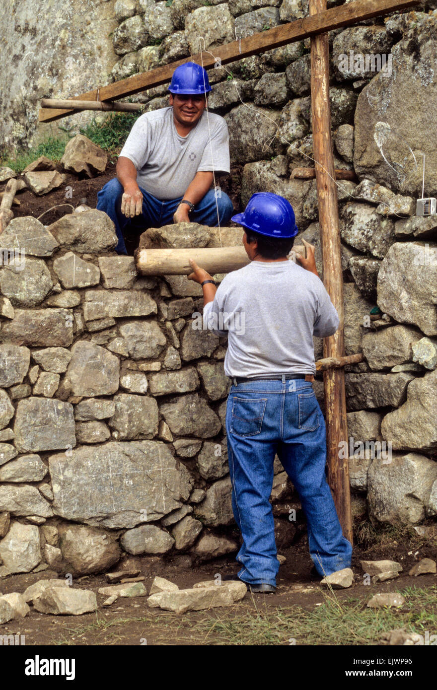 Peru, Machu Picchu. Historic Preservation. Workers Reconstructing Walls ...
