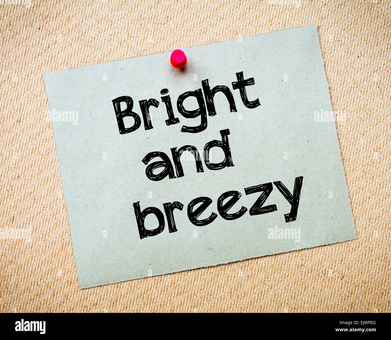 Bright and breezy Message. Recycled paper note pinned on cork board ...