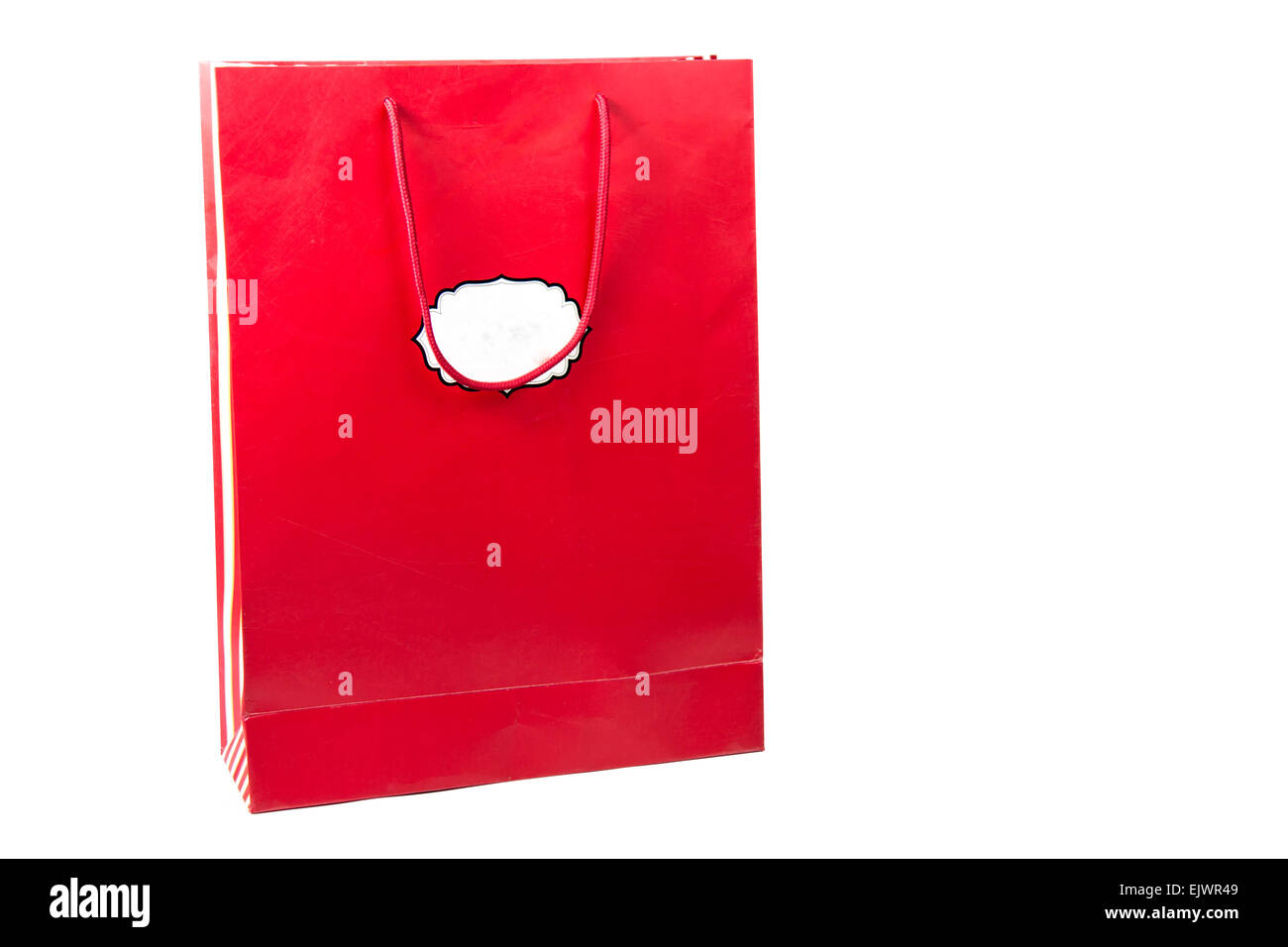 A red color paper bags isolated on white Stock Photo - Alamy