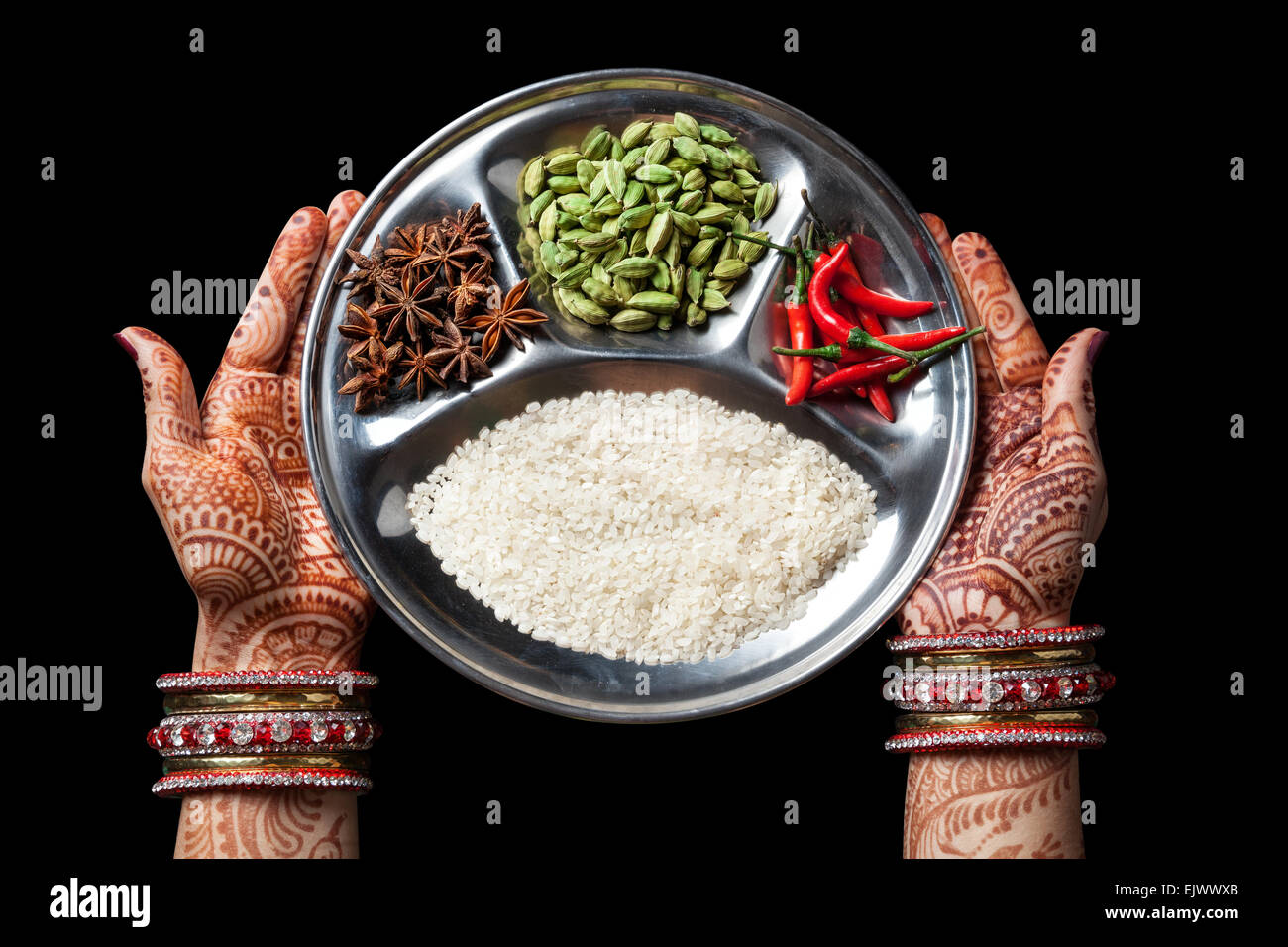 Indian woman cooking rice hi-res stock photography and images - Alamy