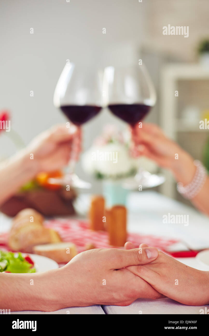 Hands of young couple on background of making toast Stock Photo - Alamy