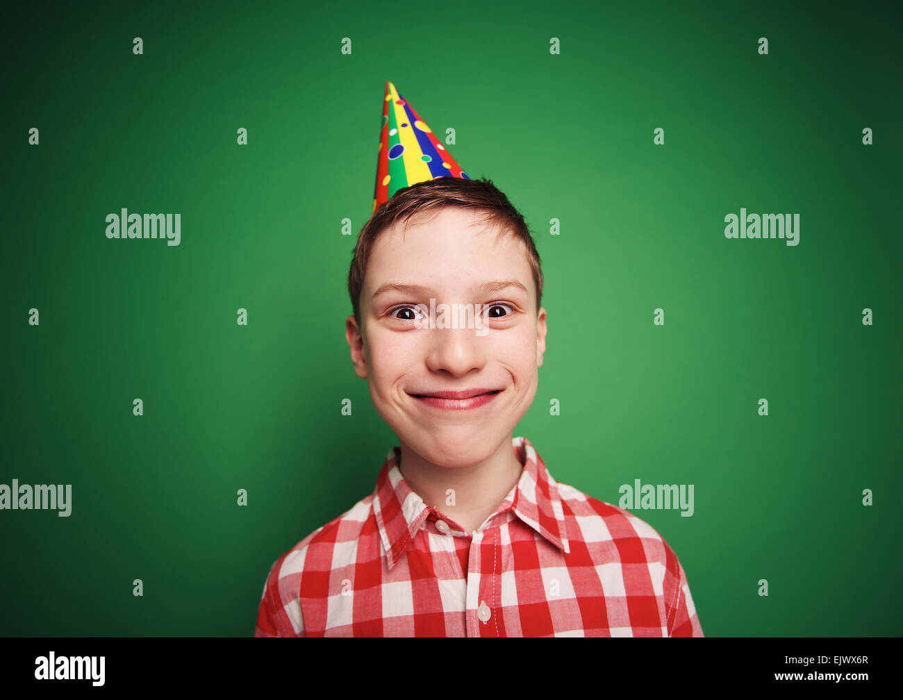Cute boy at fool’s day celebration looking at camera Stock Photo - Alamy