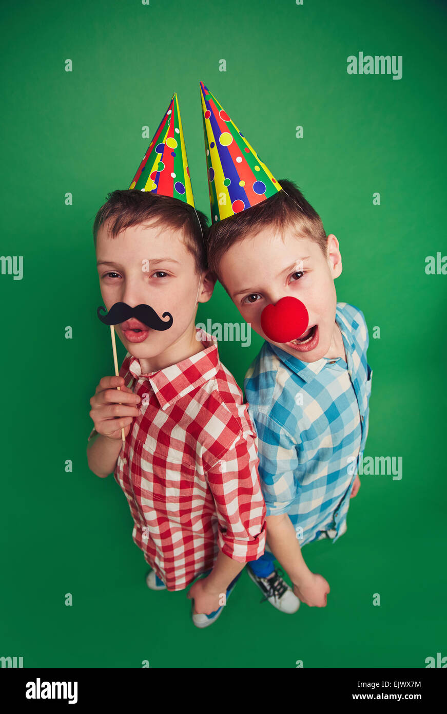 Cute twin brothers celebrating fool’s day Stock Photo - Alamy