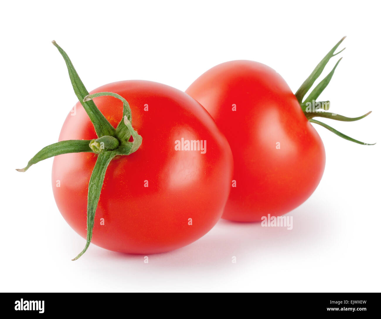 Two ripe red tomatoes isolated on white background Stock Photo - Alamy