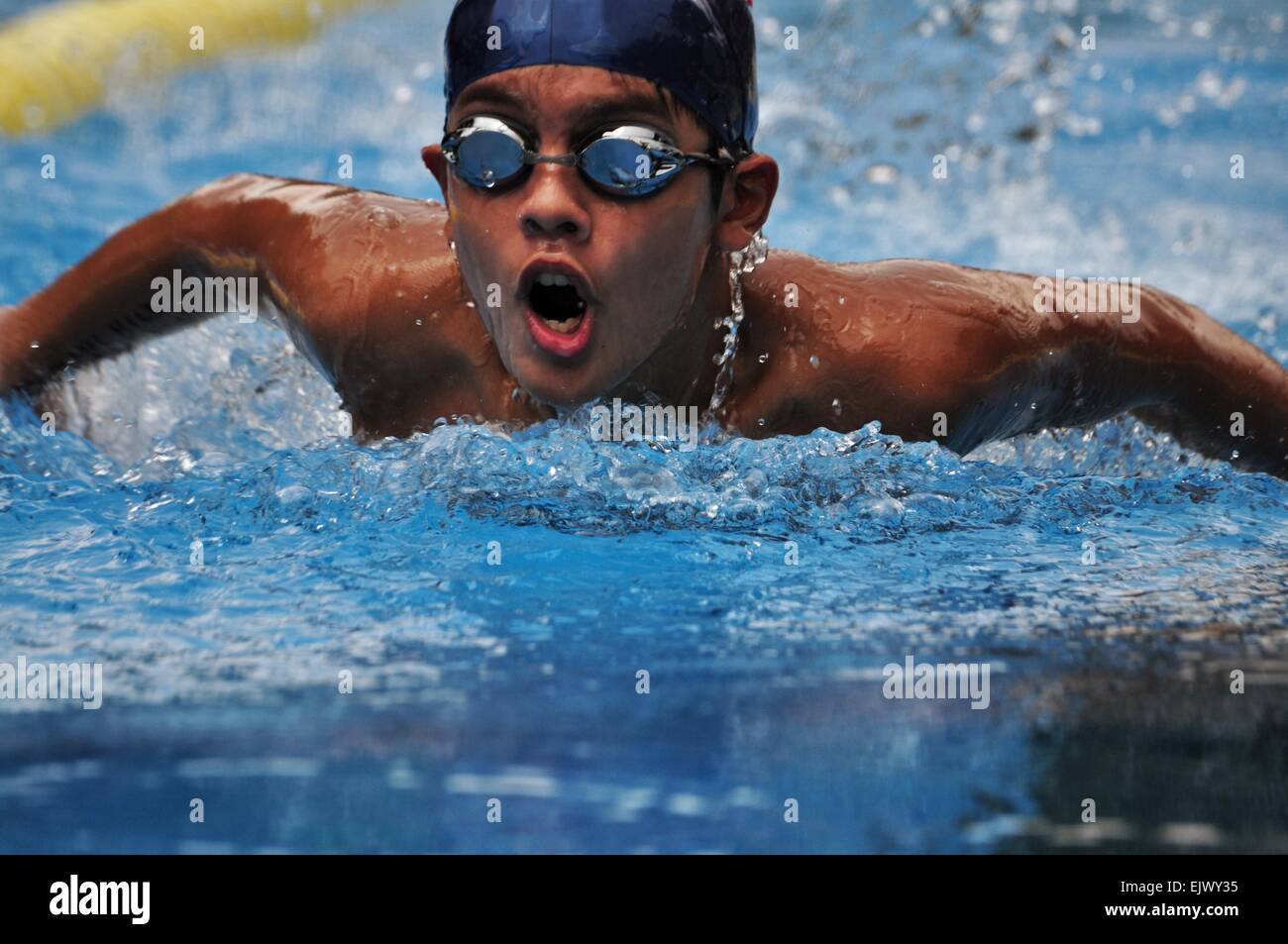 Swimmer athletic man swimming butterfly Stock Photo - Alamy