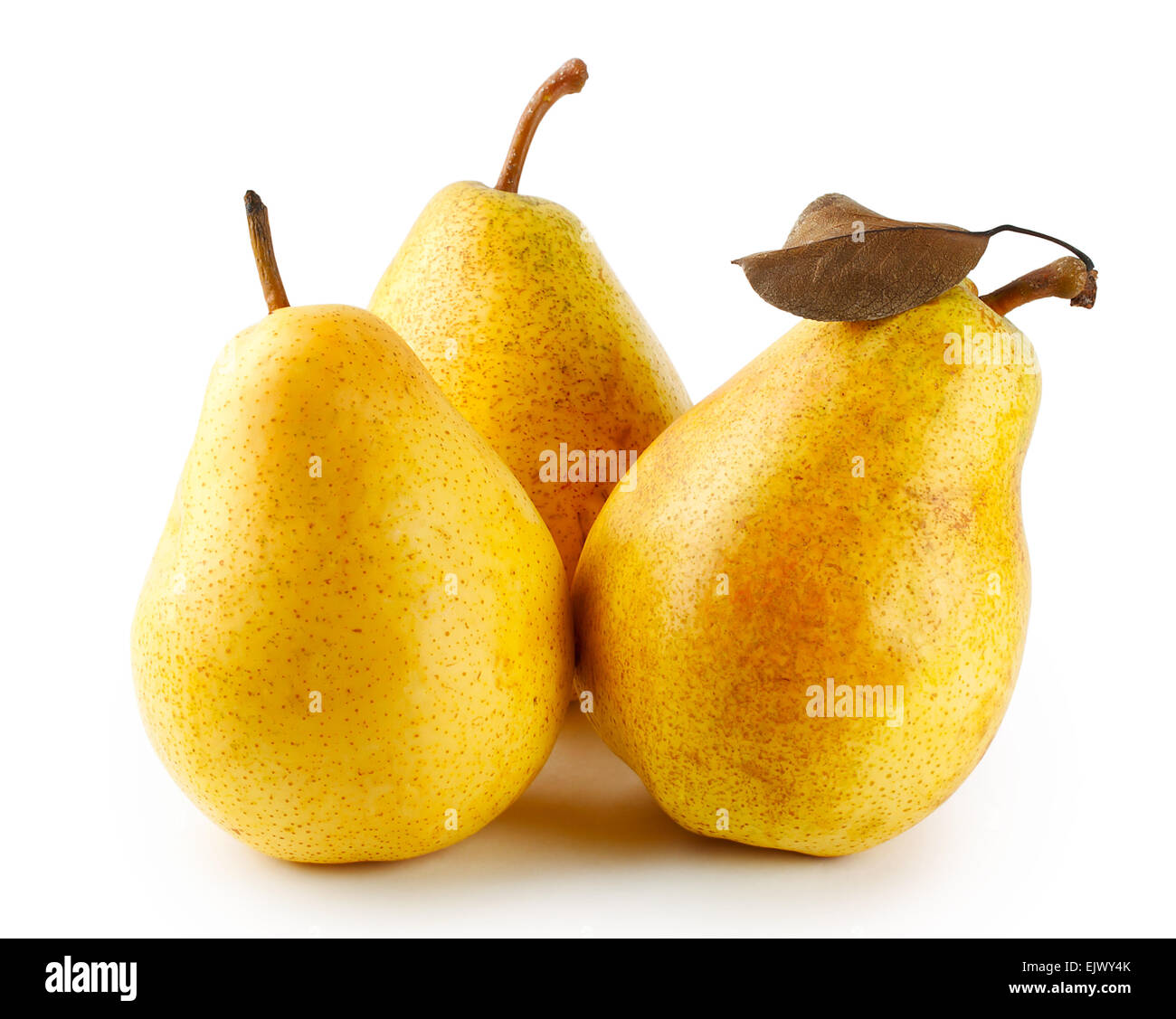 Three ripe yellow pears isolated on white background Stock Photo - Alamy