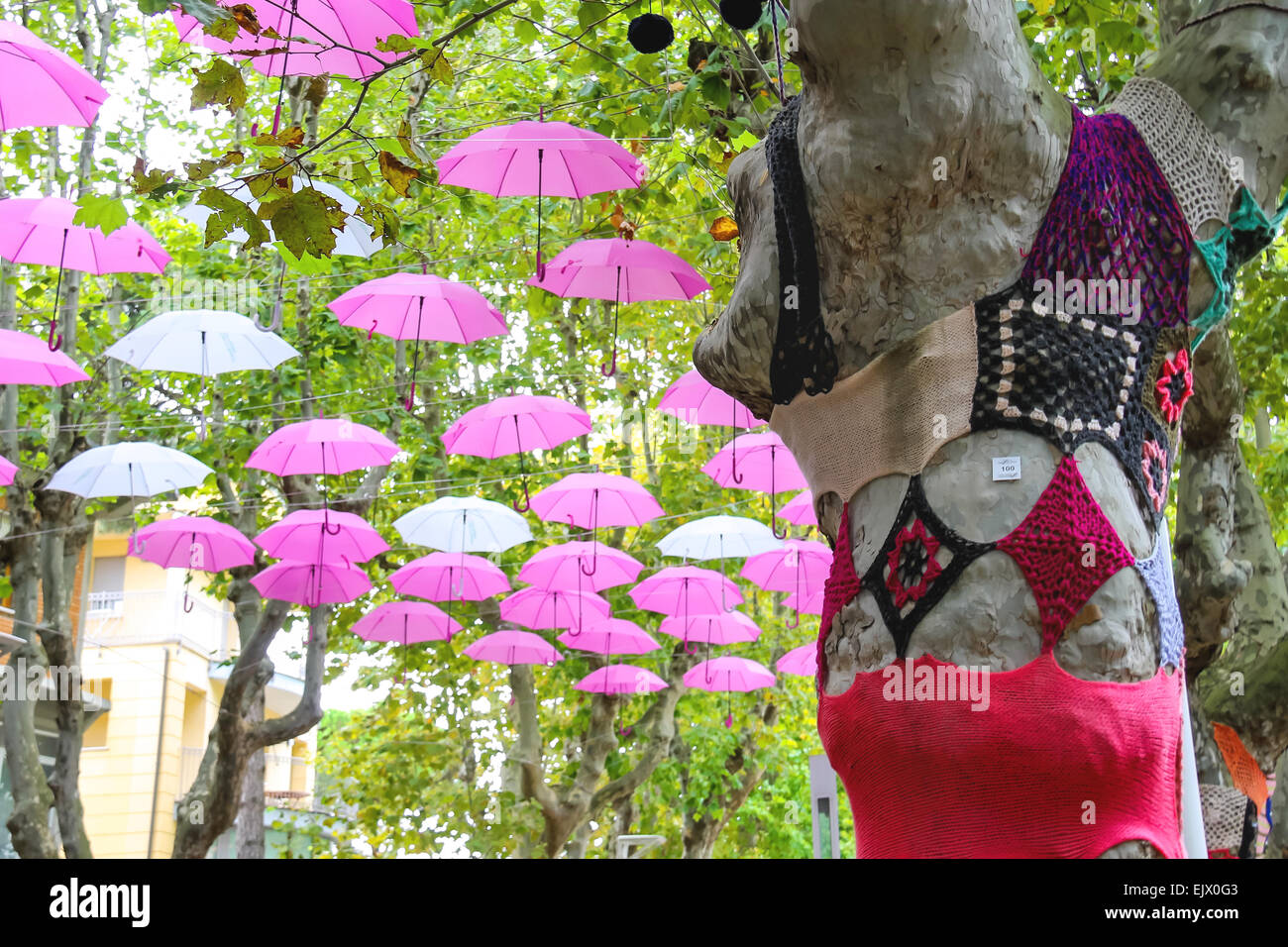 Bellaria Igea Marina, Italy - August 14, 2014: Knitted clothes on trees ...