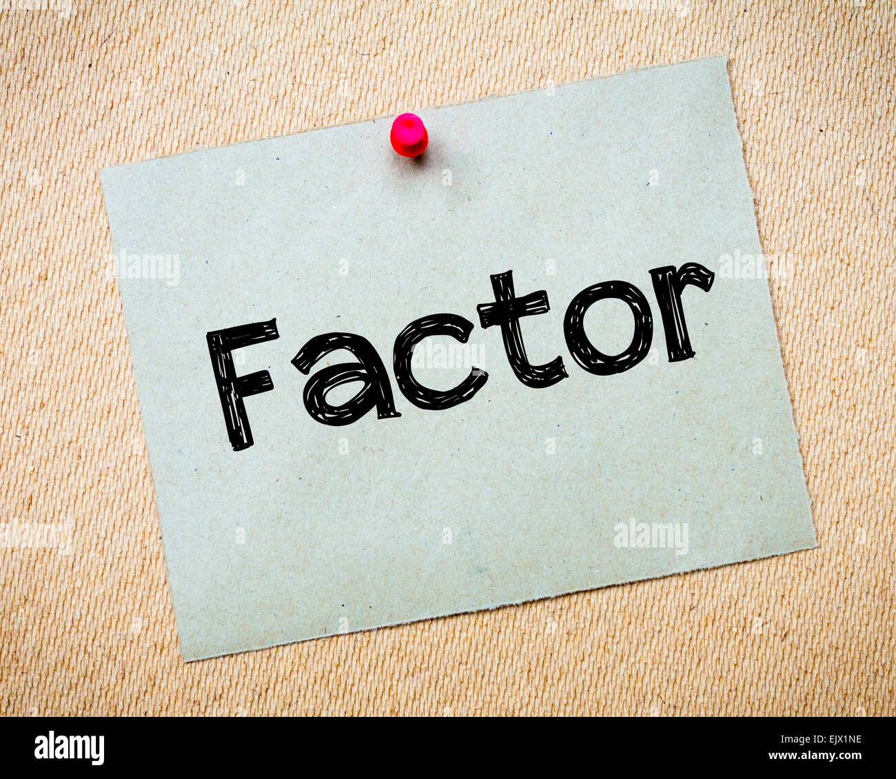 Factor Message. Recycled paper note pinned on cork board. Concept Image ...