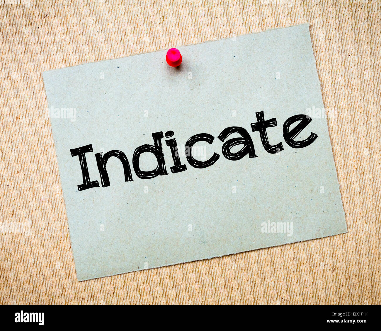 Indicate Message. Recycled paper note pinned on cork board. Concept ...