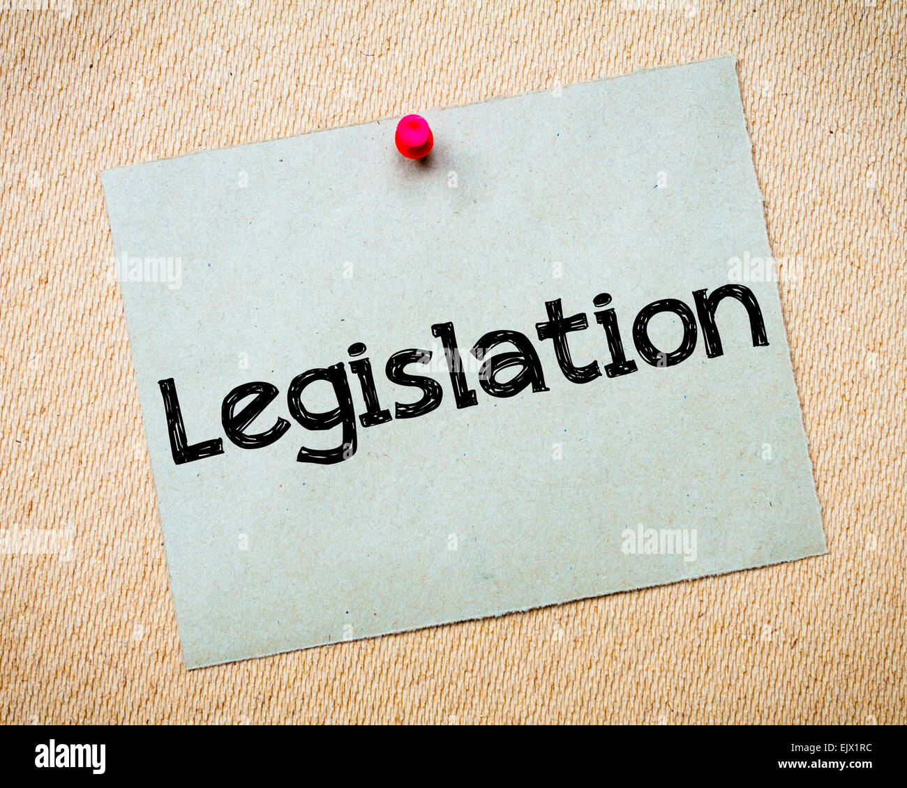 Legislation Message. Recycled paper note pinned on cork board. Concept ...