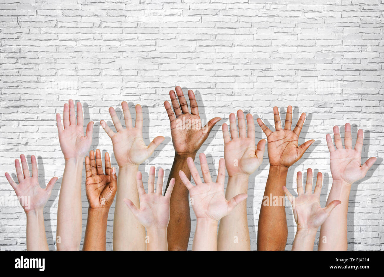 Hand raised college hi-res stock photography and images - Alamy