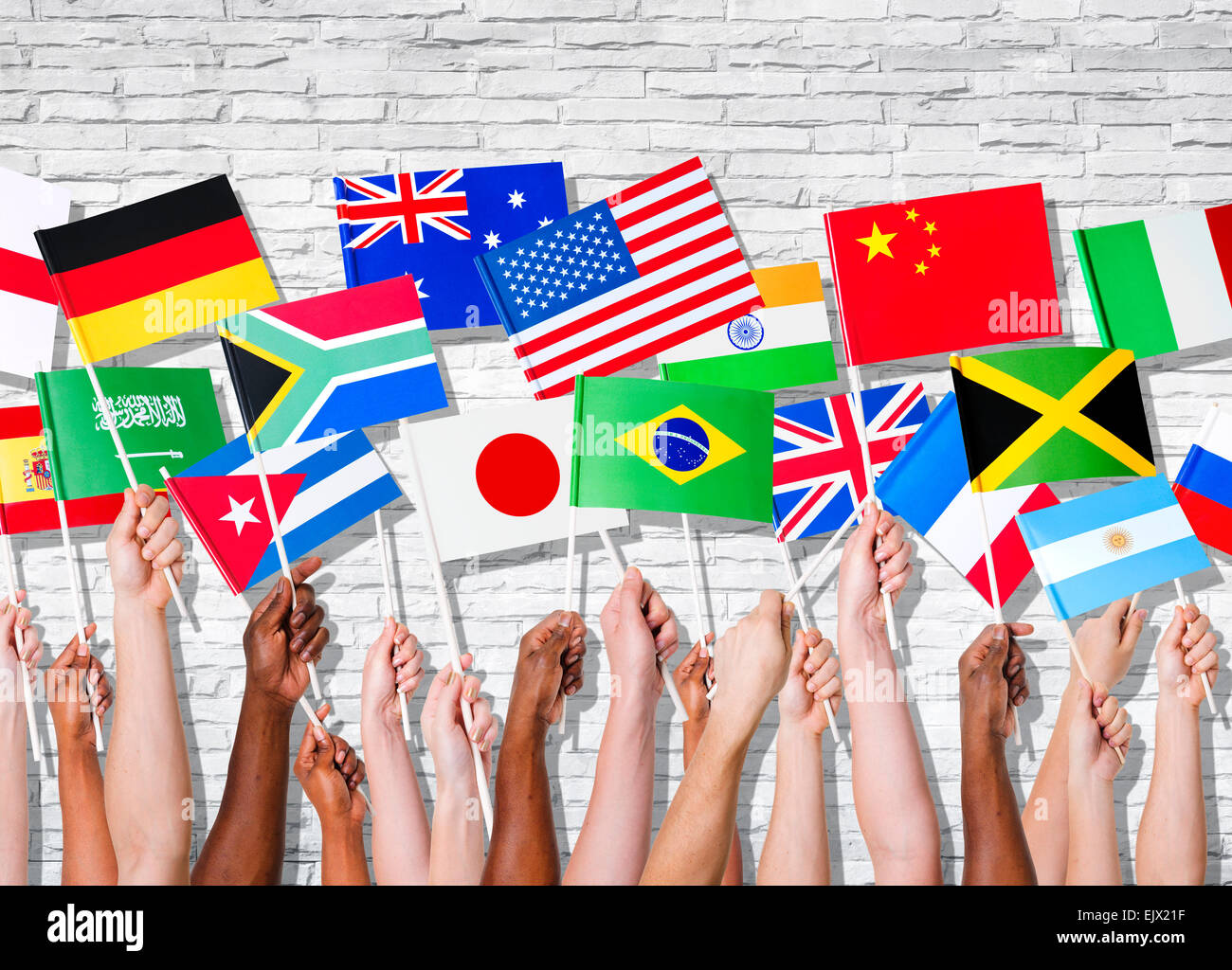 Different countries united with their flags raised Stock Photo - Alamy