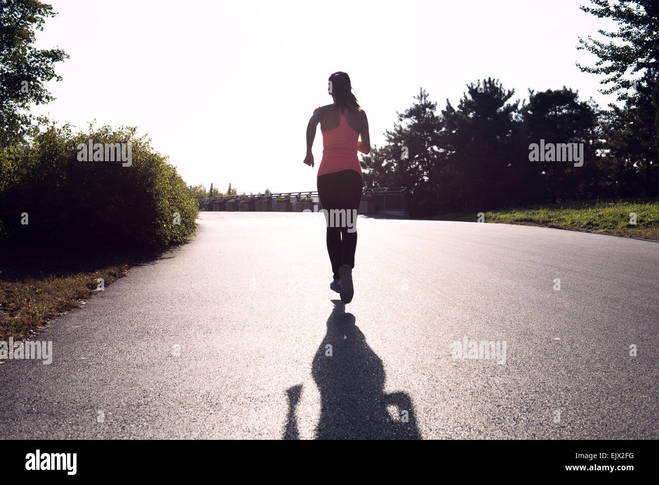 Young woman jogging Stock Photo - Alamy Young woman jogging Stock Photo - Alamy