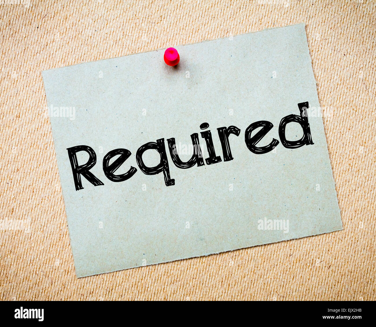 Required Message. Recycled paper note pinned on cork board. Concept ...