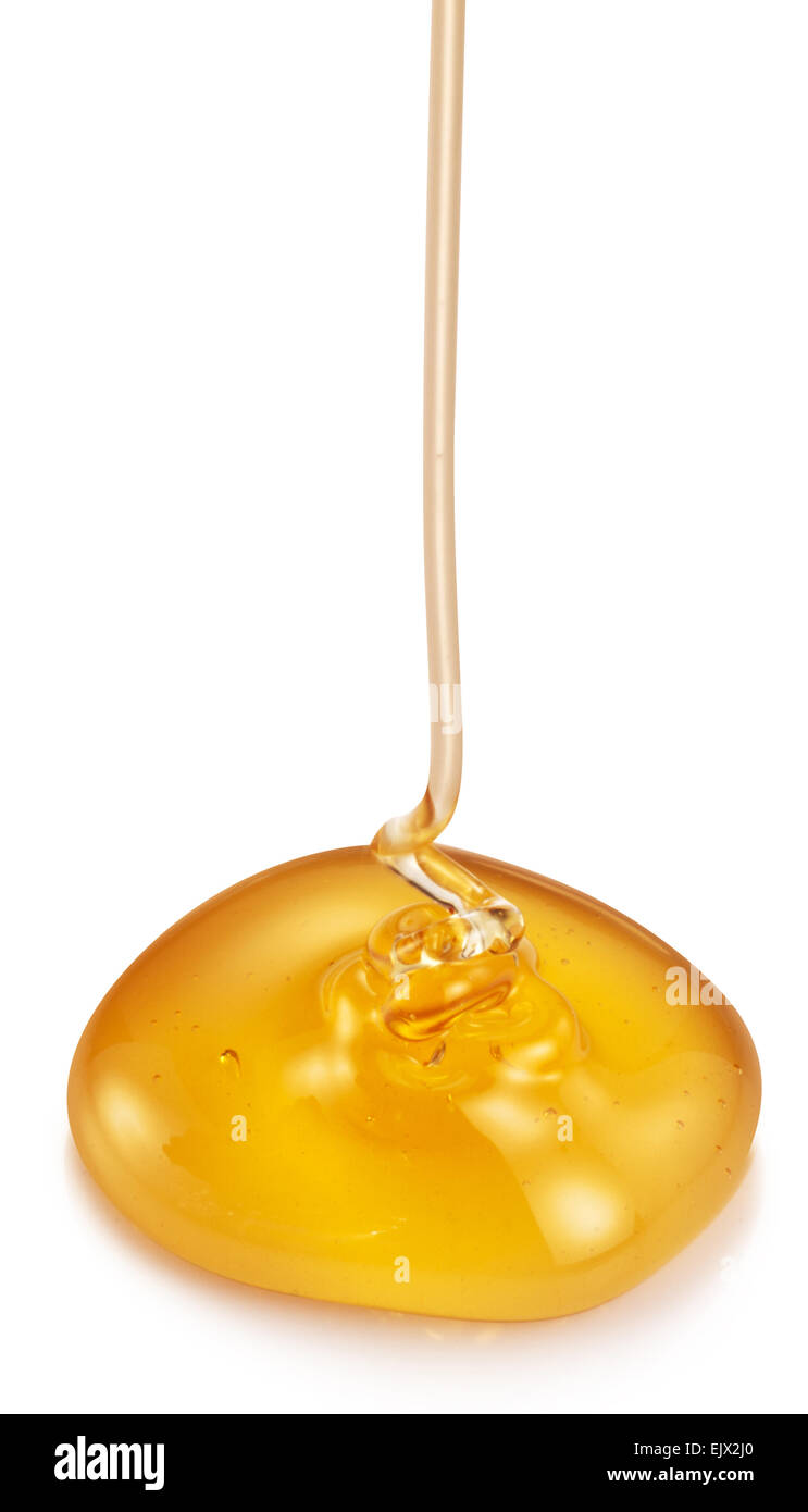 Honey flowing on white background. Clipping paths Stock Photo - Alamy