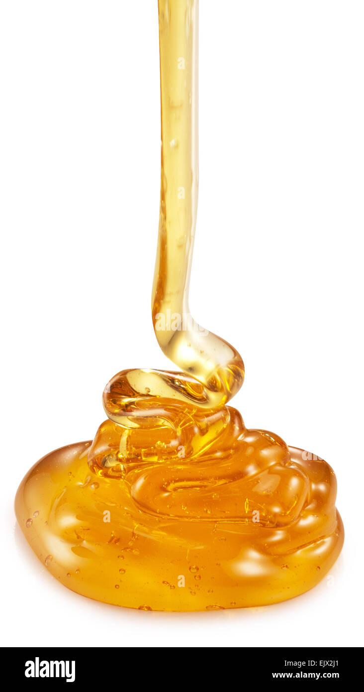 Honey flowing on white background. Clipping paths Stock Photo - Alamy