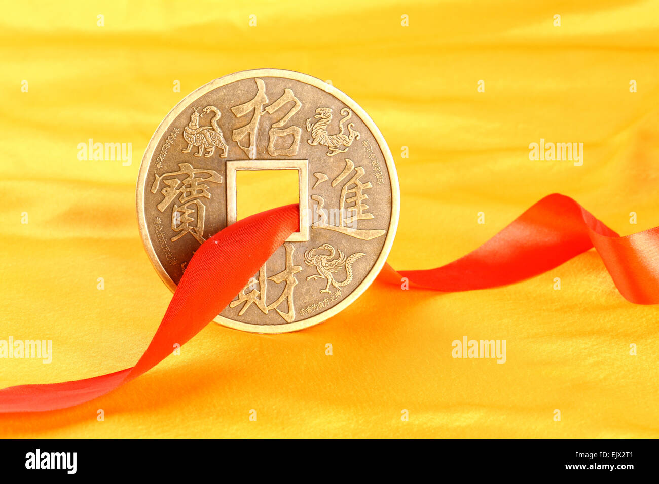 Coins and ribbon Stock Photo - Alamy