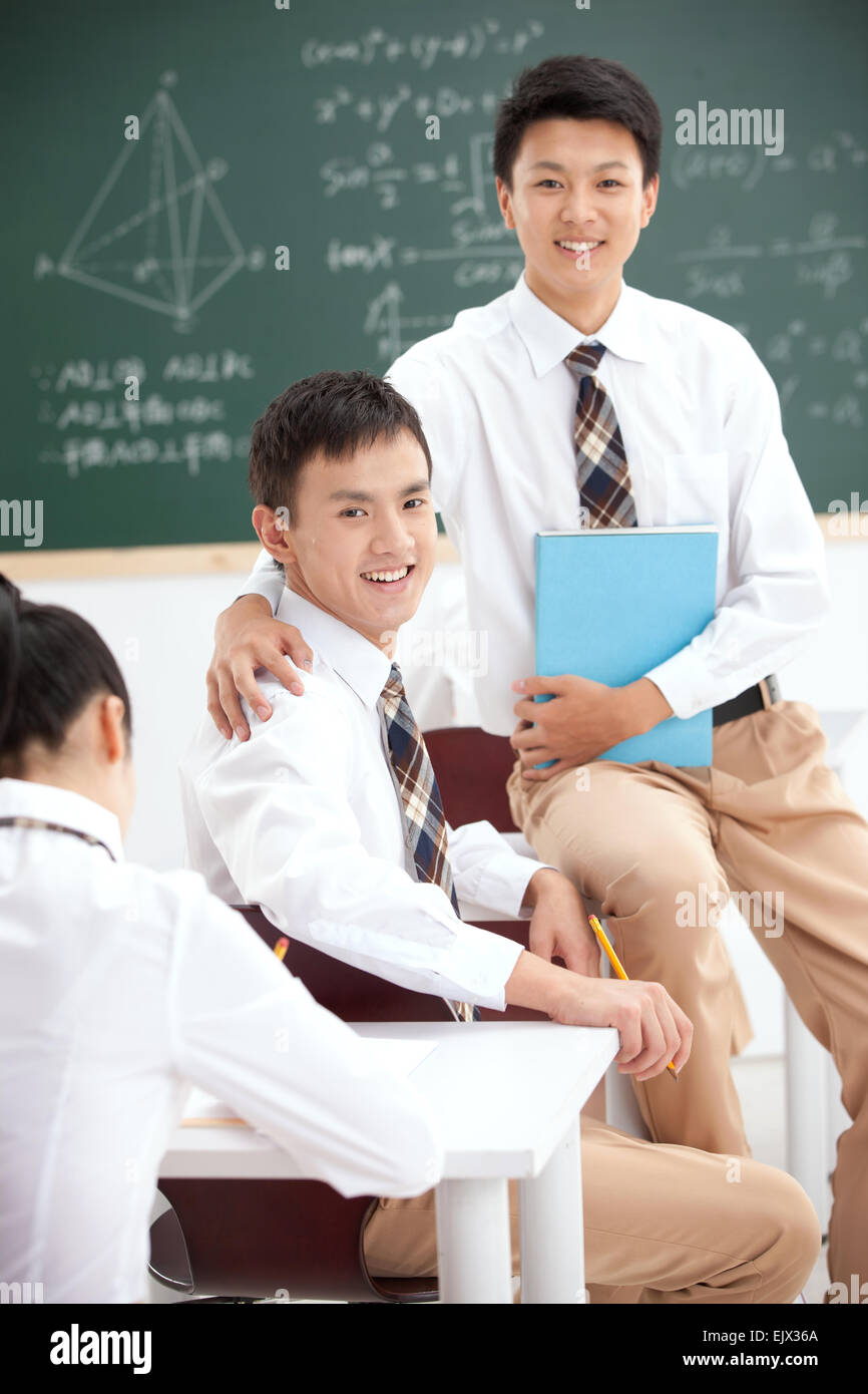 Children sitting around table school hi-res stock photography and ...