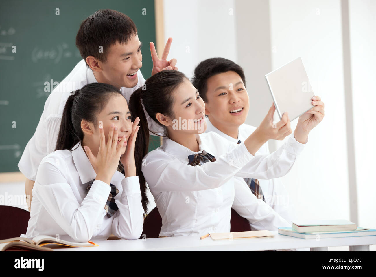 High school students took the tablet computer in pictures Stock Photo ...