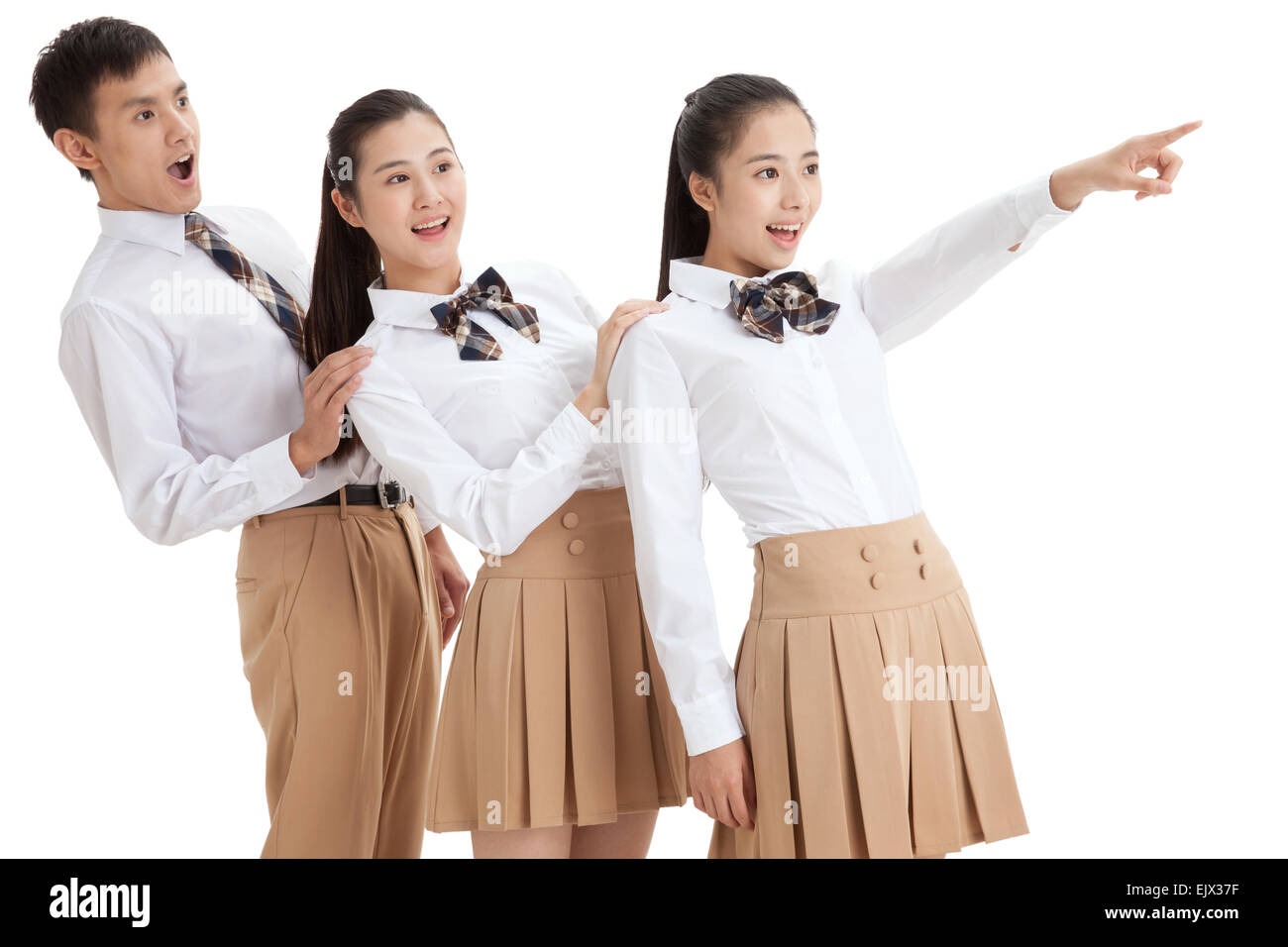 Three high school students are surprised to see to the side Stock Photo ...