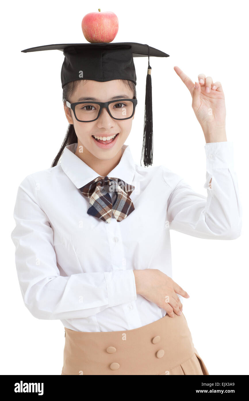 The girl wearing the caps in head with apple Stock Photo - Alamy