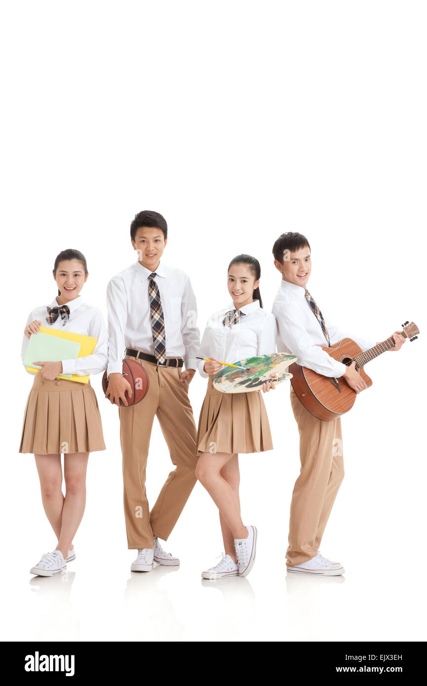 Four modelling of cool high school students Stock Photo - Alamy