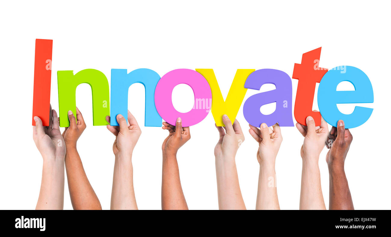 Diverse People Holding the Word Innovate Stock Photo - Alamy