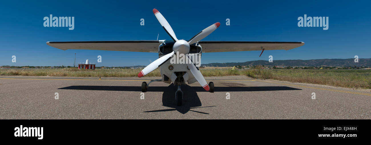 A four-propeller aircraft closeup panorama parked on airfield Stock ...