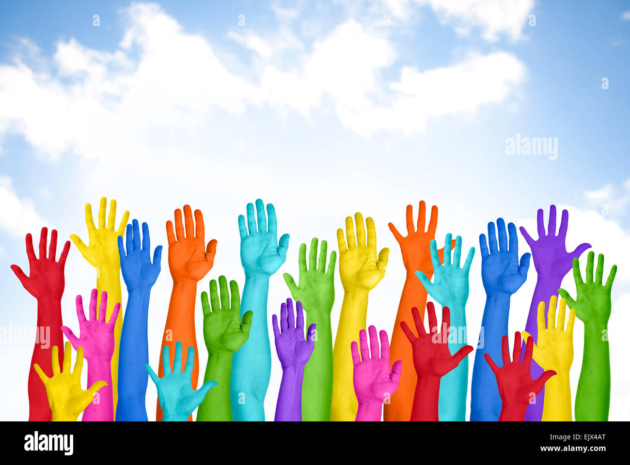 Colorful Hands Raised With Blue Sky Stock Photo - Alamy