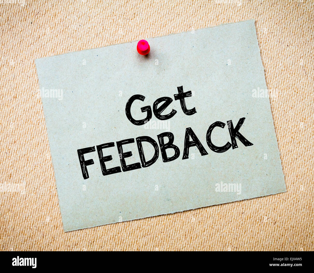 Get Feedback Message. Recycled paper note pinned on cork board. Concept ...