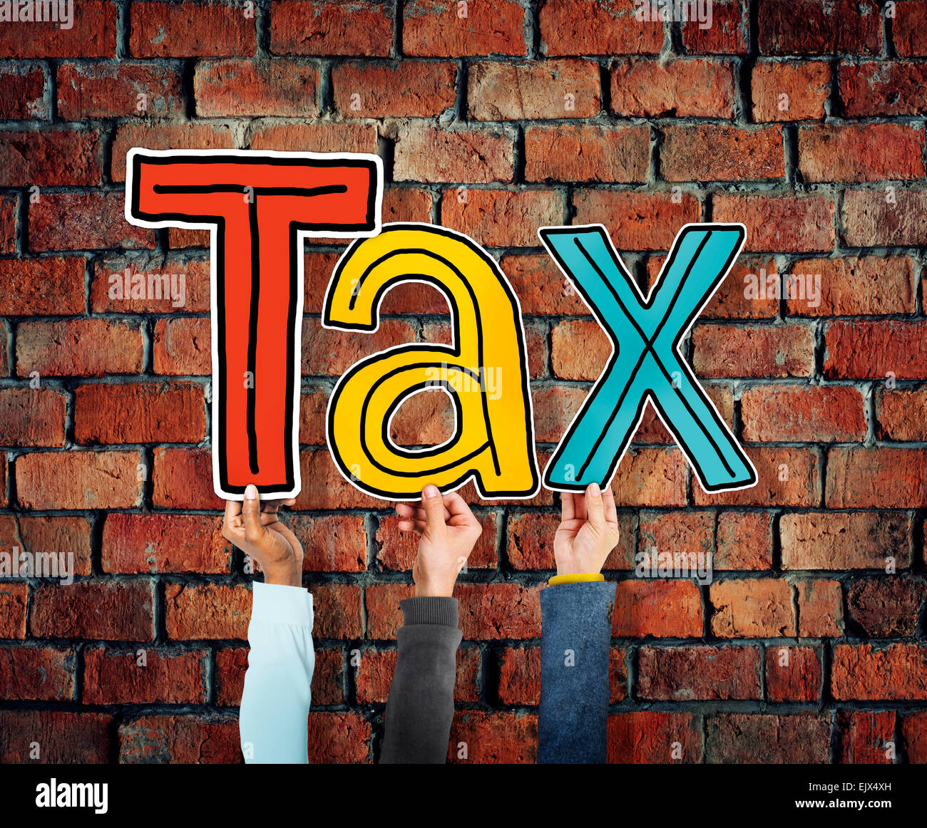 Group of Hands Holding the Word Tax Stock Photo - Alamy