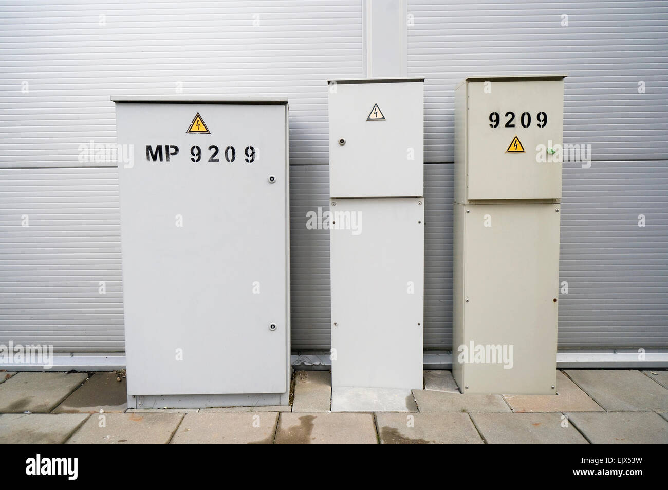 Metal gray boxes with electric power distributing devices. Concept of ...