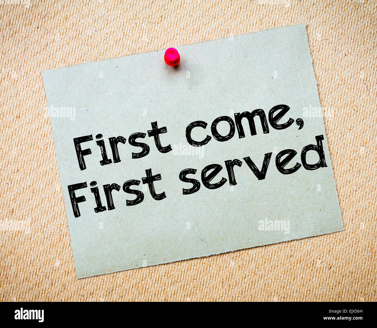 First come, first served Message. Recycled paper note pinned on cork board. Concept Image Stock ...