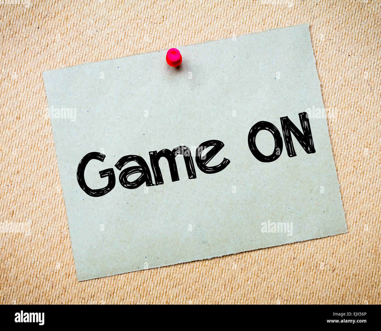 Game ON Message. Recycled paper note pinned on cork board. Concept ...
