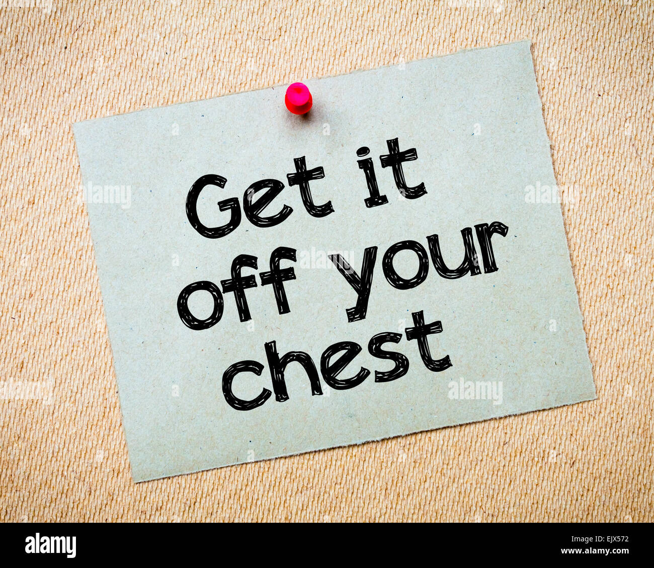Get it off your chest Message. Recycled paper note pinned on cork board ...