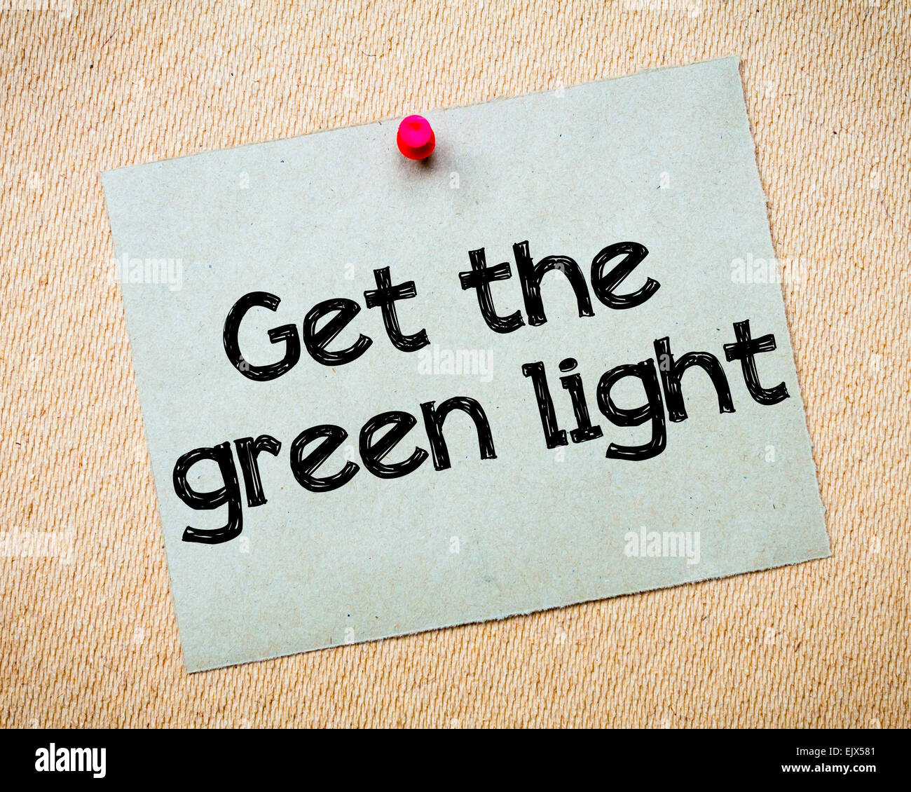 Get the Green Light Message. Recycled paper note pinned on cork board ...