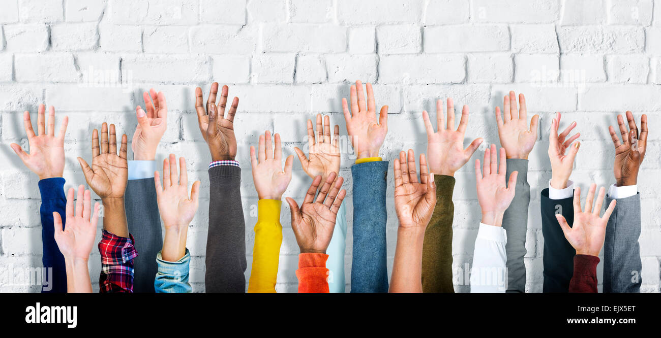 Group of Diverse People's Hands Raised Stock Photo - Alamy