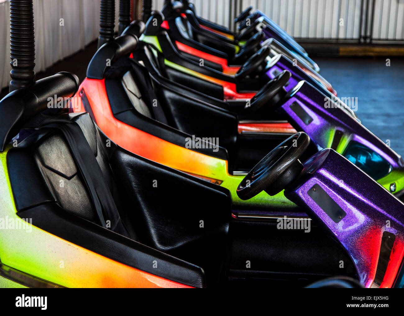 Bumper cars dodgems in a line at a fun fair Stock Photo - Alamy