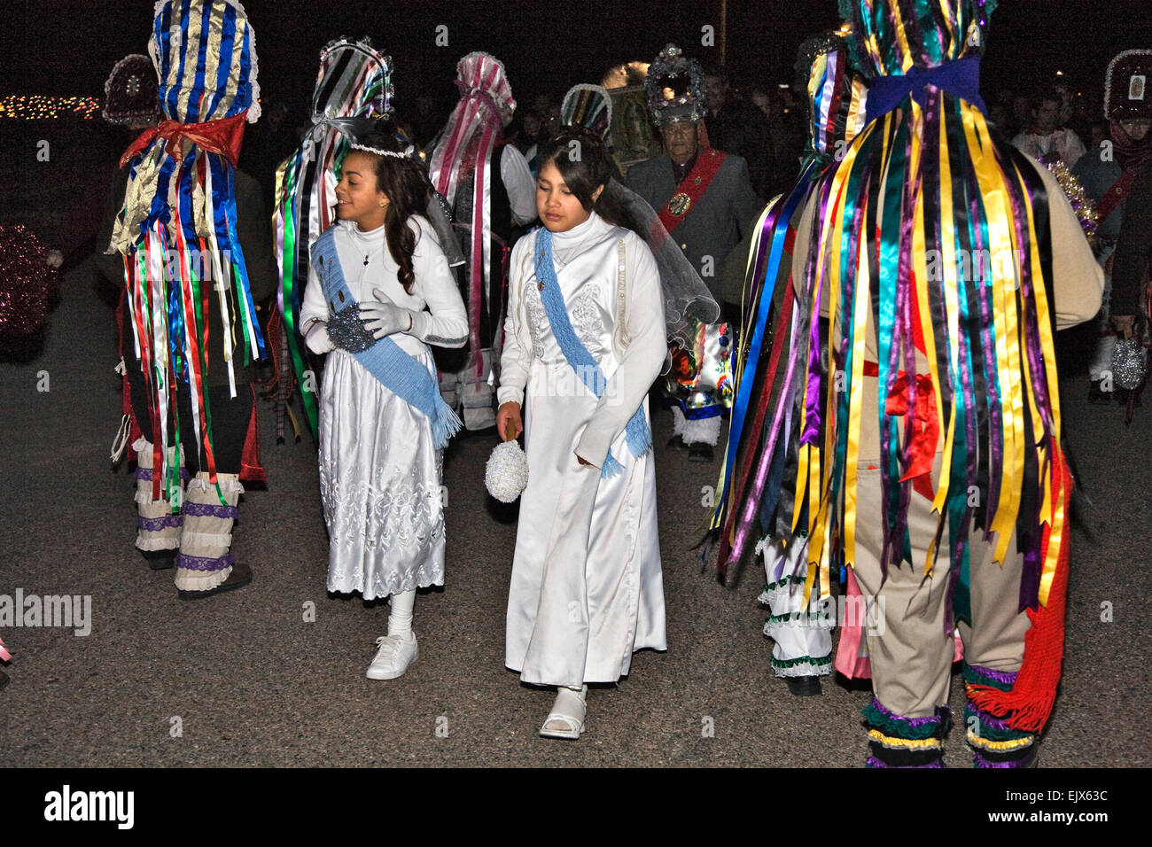 Young girls dressed in white to portray the character of Malinche walk ...