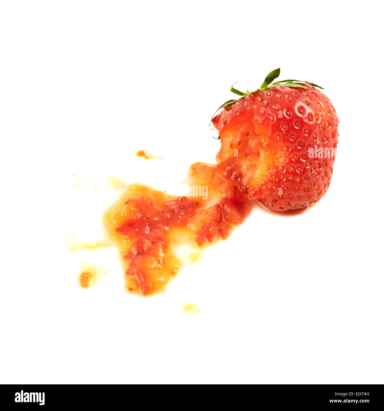Squashed strawberry isolated Stock Photo - Alamy