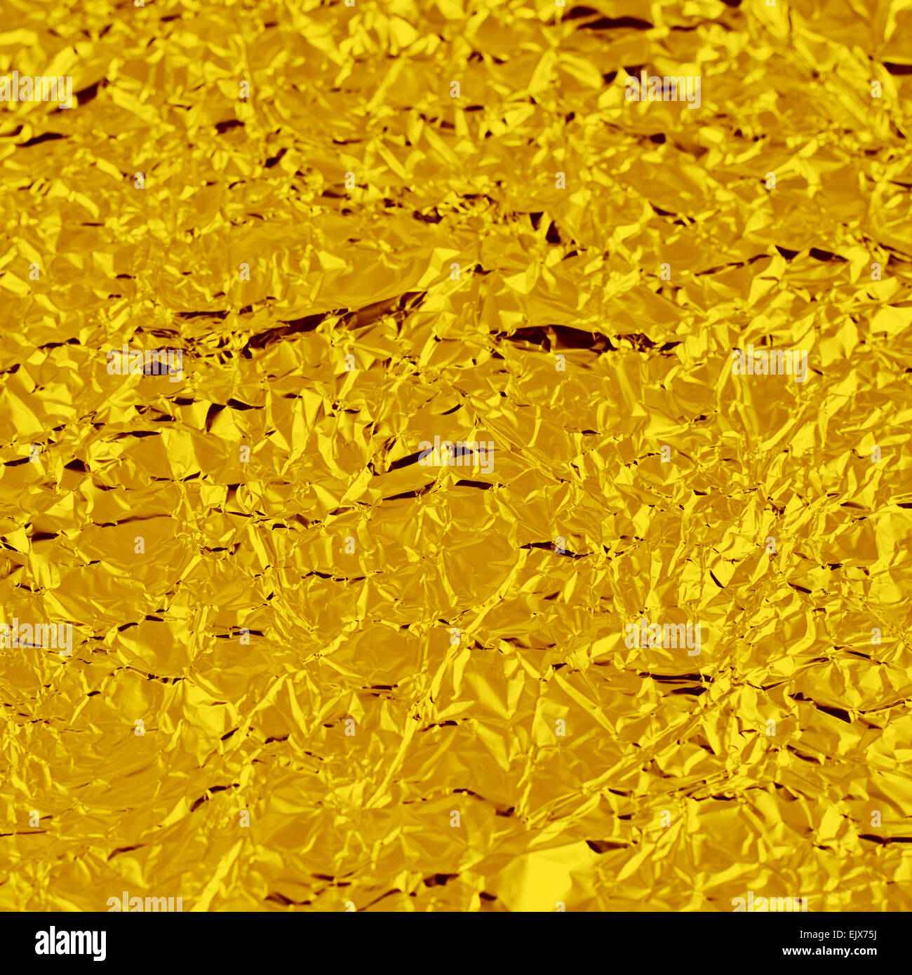 Aluminum golden foil texture Stock Photo - Alamy
