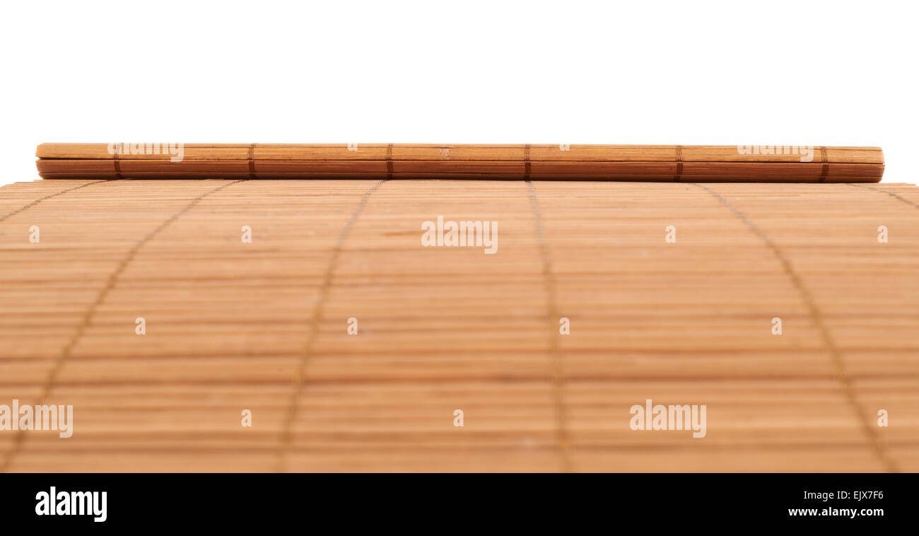 Rolled straw mat Stock Photo - Alamy