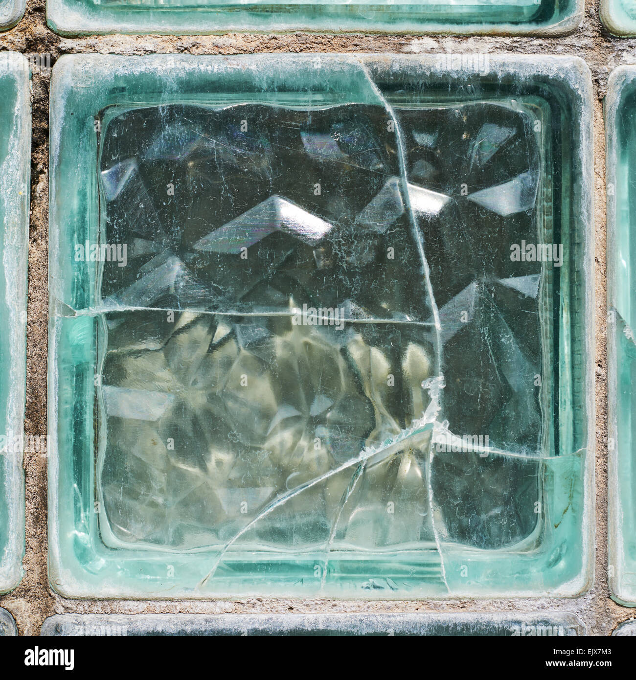 Cracked glass brick Stock Photo - Alamy