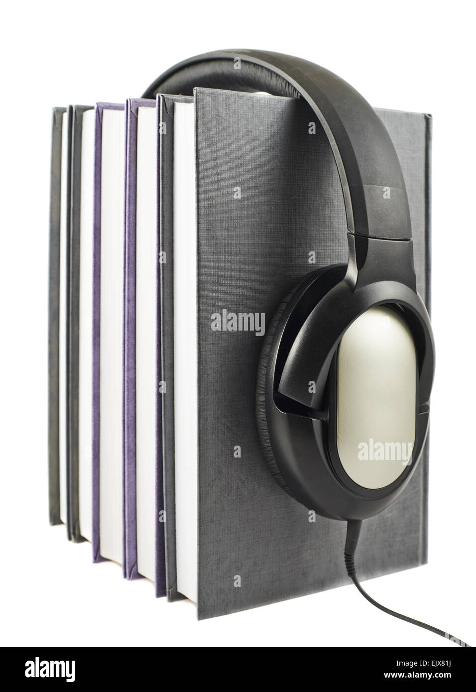 Books with a headphones on isolated Stock Photo - Alamy